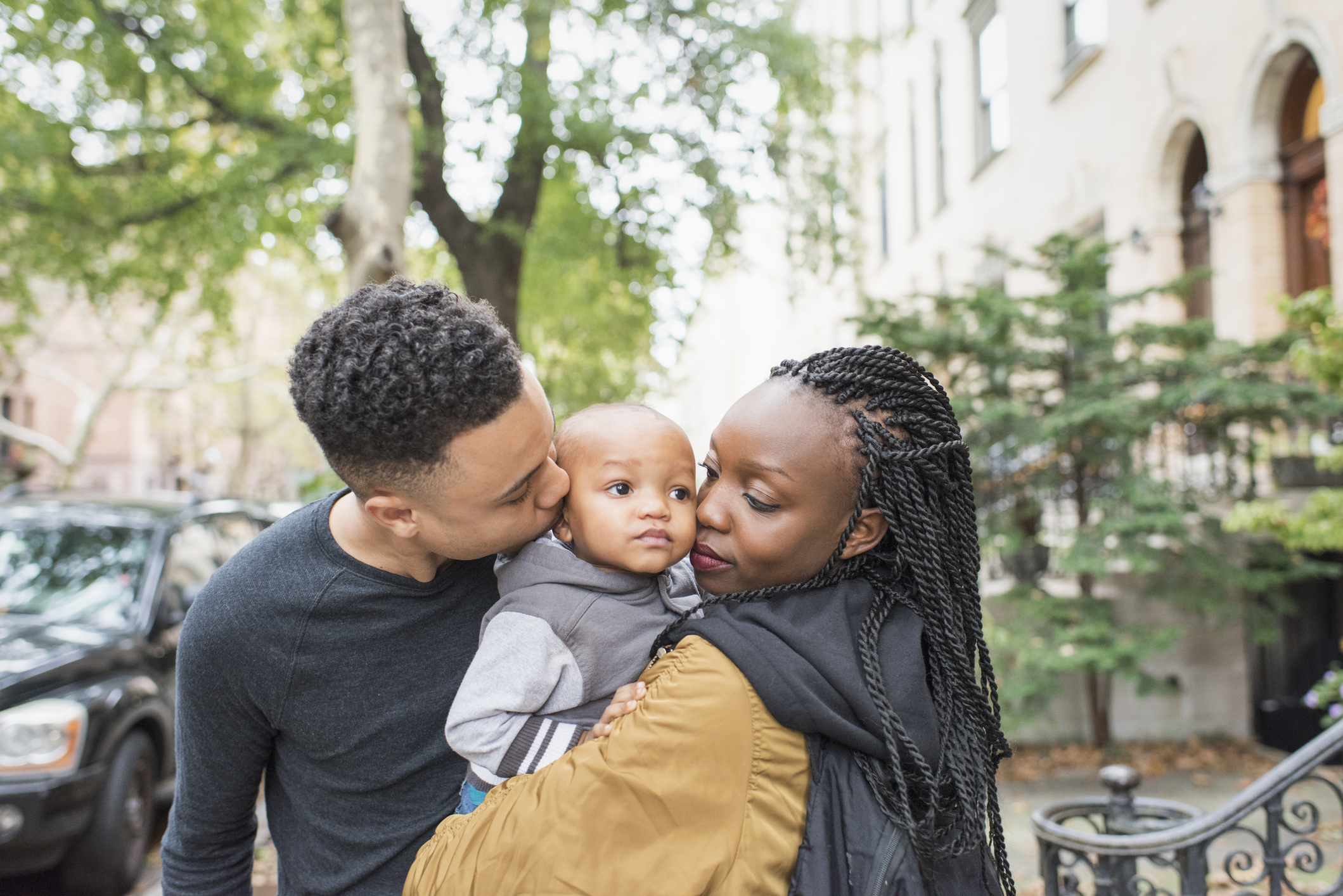 Young family in their city neighborhood street – Friends Rehabilitation ...